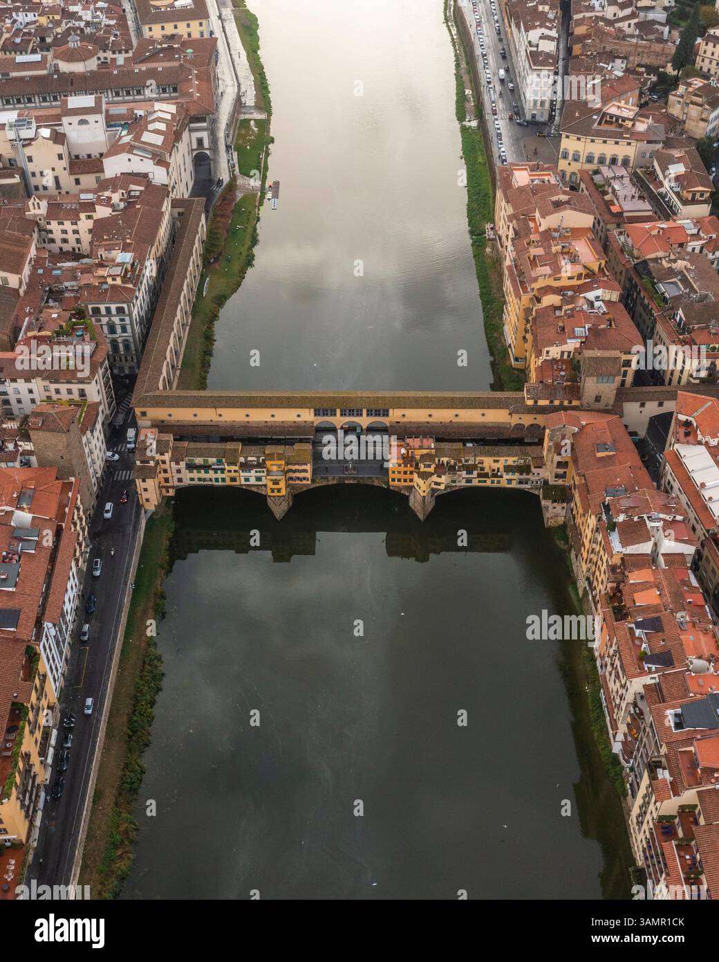 Aerial view of Ponte Vecchio bridge crossing the Arno river in Florence ...
