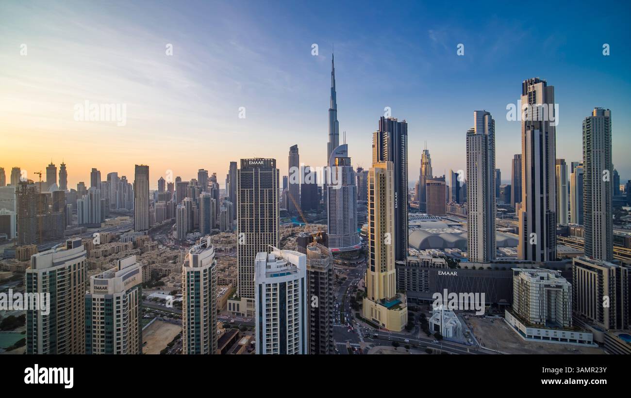 Aerial view of Burj Khalifa and Dubai skyline at sunset, United Arab ...