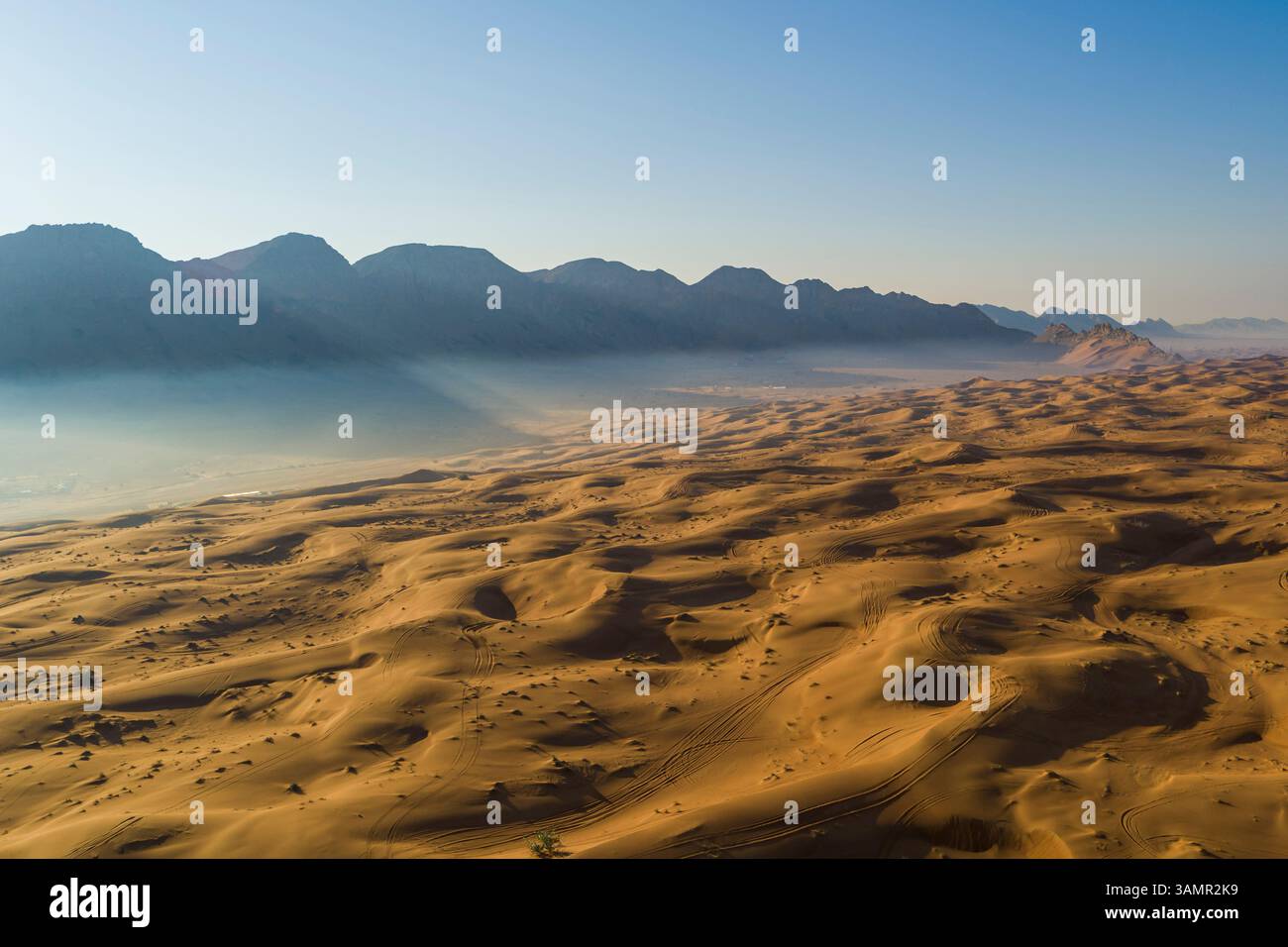 Aerial view of sand dunes near the Sphinx in the desert at sunset ...