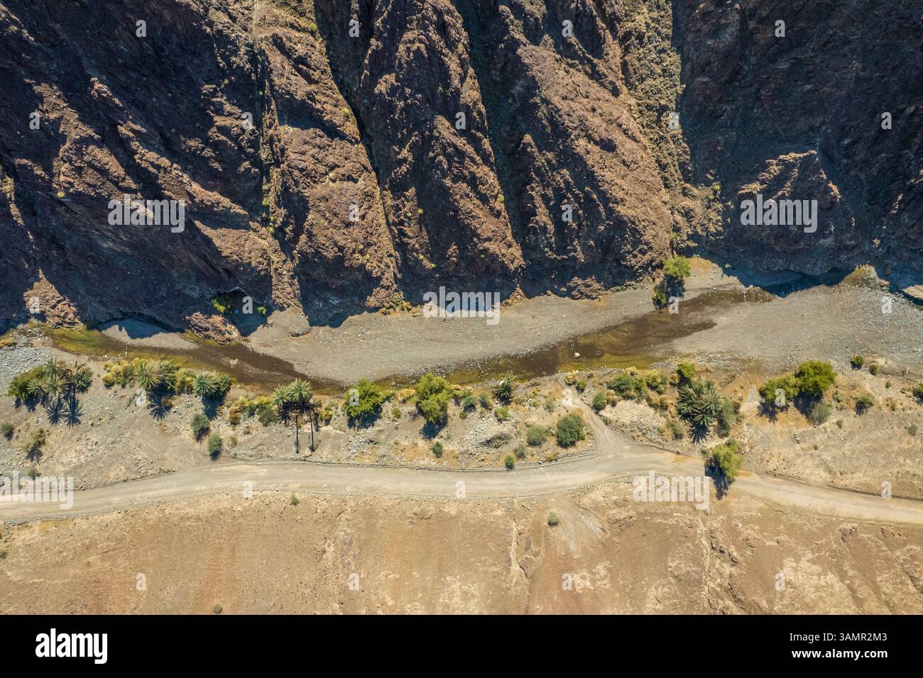 Aerial view of Wadi Shawqa, a canyon among the rocky hills in Ras al ...