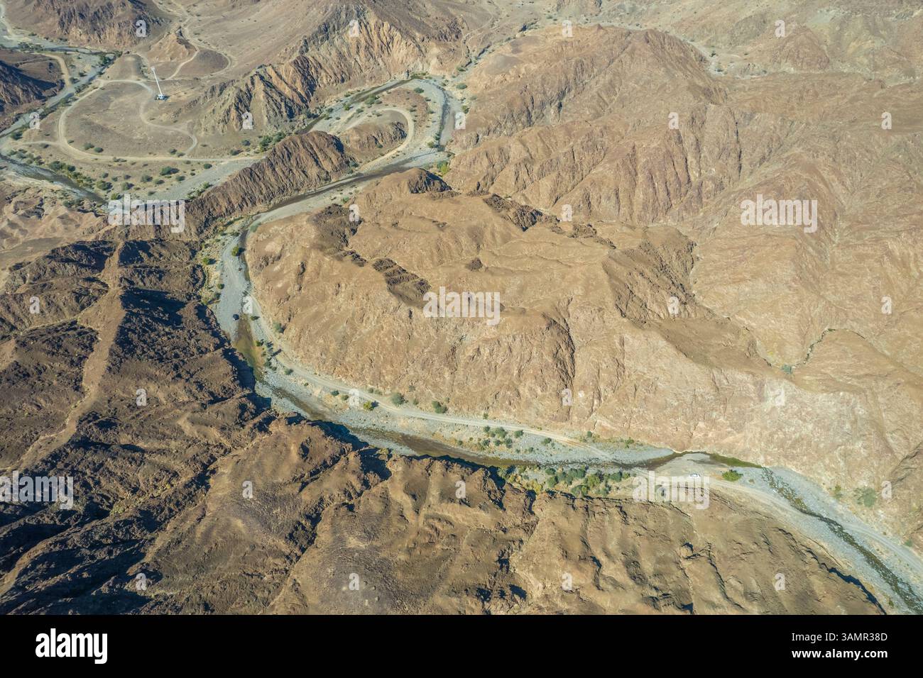 Aerial view of Wadi Shawqa, a canyon among the rocky hills in Ras al ...