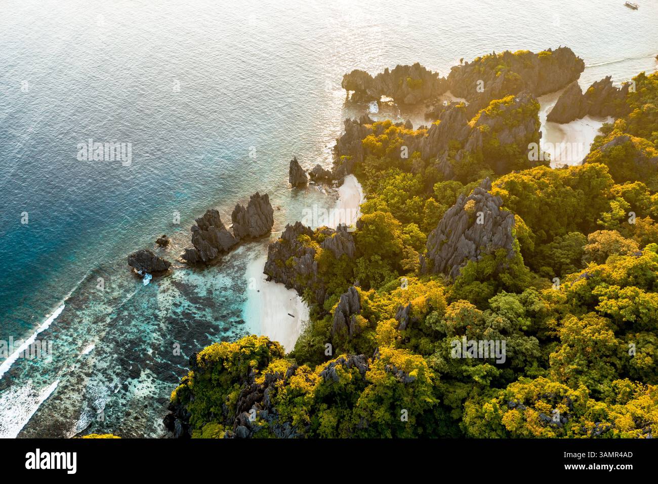 Aerial view sharp cliffs and sandy beaches of El Nido, the Philippines ...