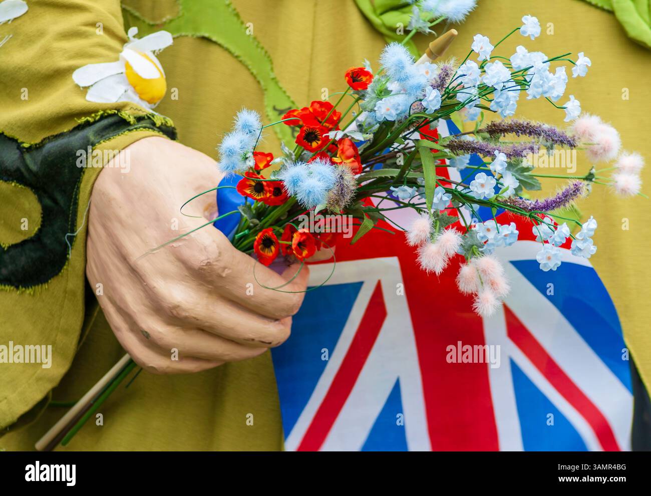Giant hand holding posy at Hastings Traditional Jack in the Green Stock ...