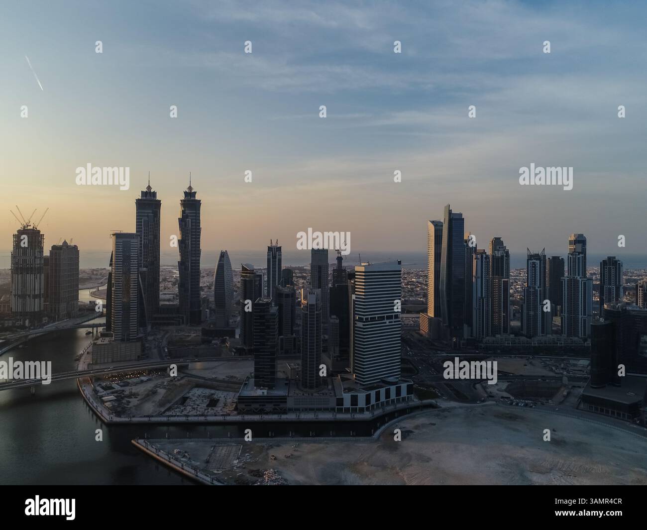 Aerial view of skyscrapers and canal in Dubai, United Arab Emirates ...