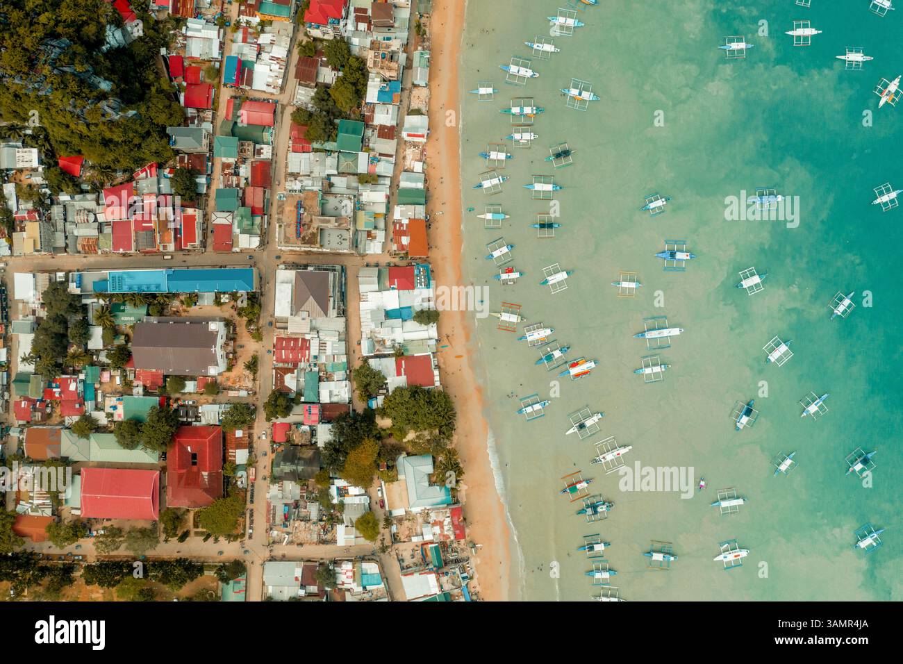 Aerial view of outriggers moored in harbour, El Nido, the Philippines ...