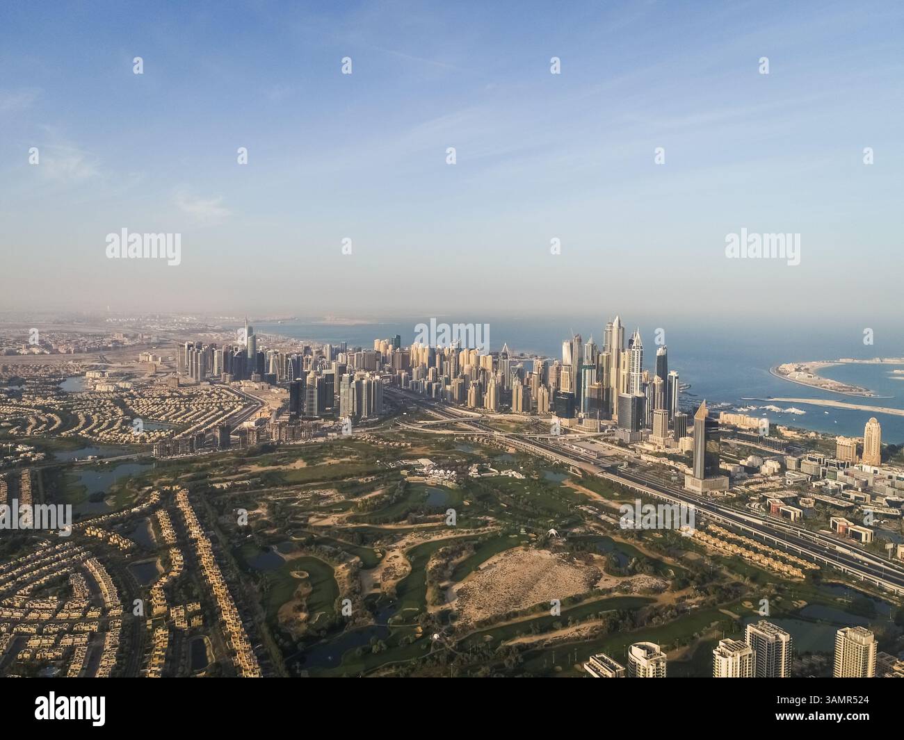 Aerial view of skyscrapers and Emirates Hills park in Dubai, United ...