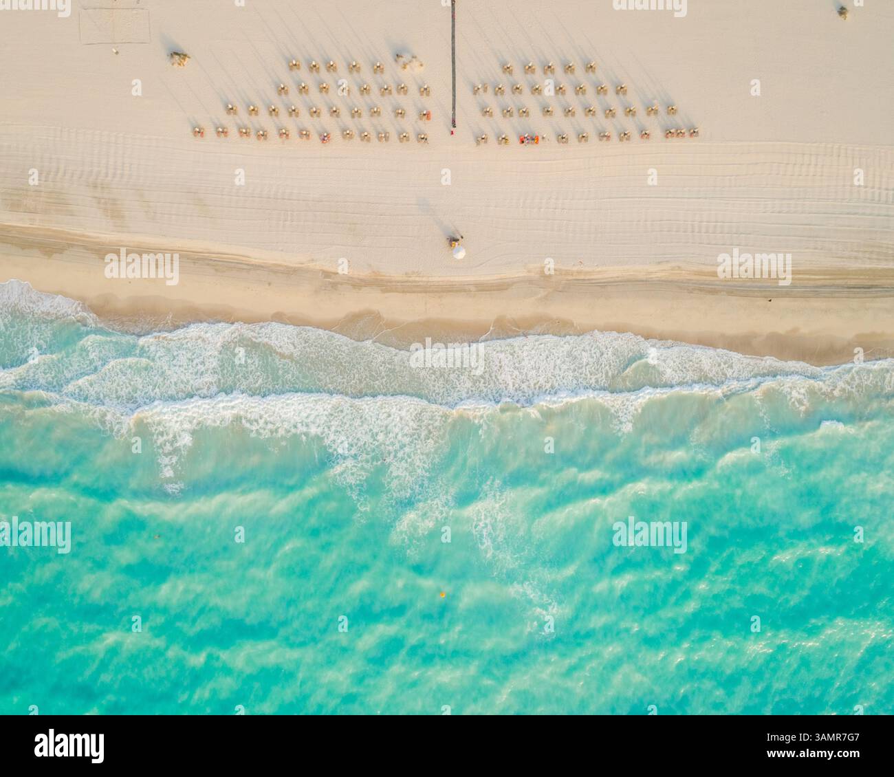 Aerial view of umbrellas and sun chair at beach, Abu Dhabi, U.A.E Stock ...