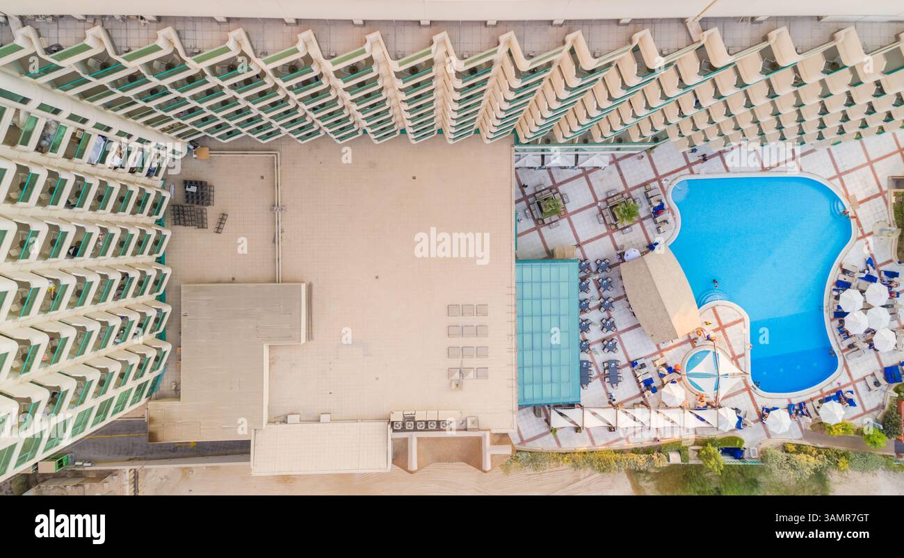 Aerial view of balconies facing swimming pool, Dubai, U.A.E Stock Photo ...