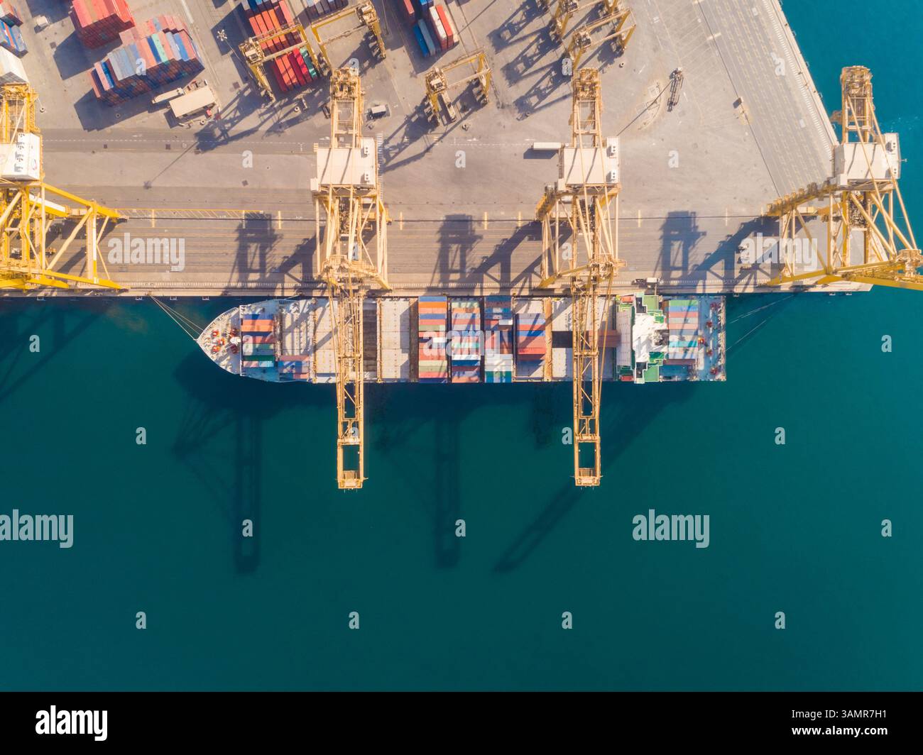 Aerial view of a boat being loaded with containers, Dubai, U.A.E Stock ...
