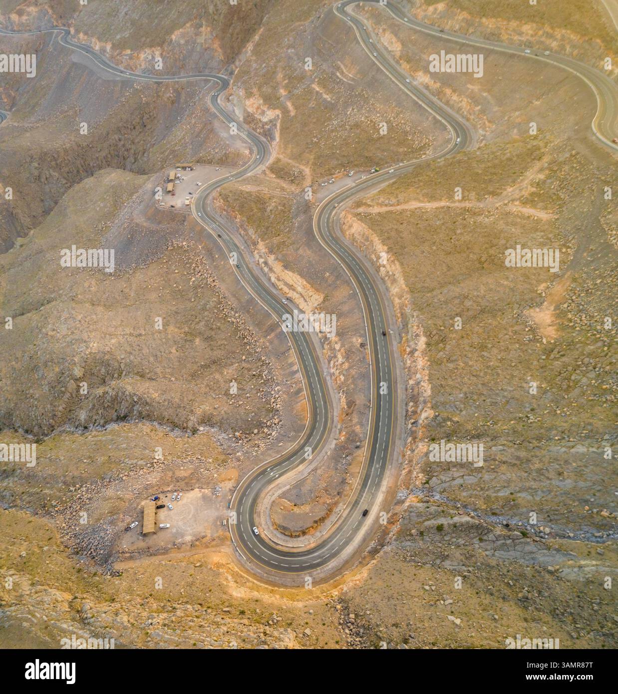 Aerial view of serpentine road in Jebel Jais rocky mountains in Ras Al ...
