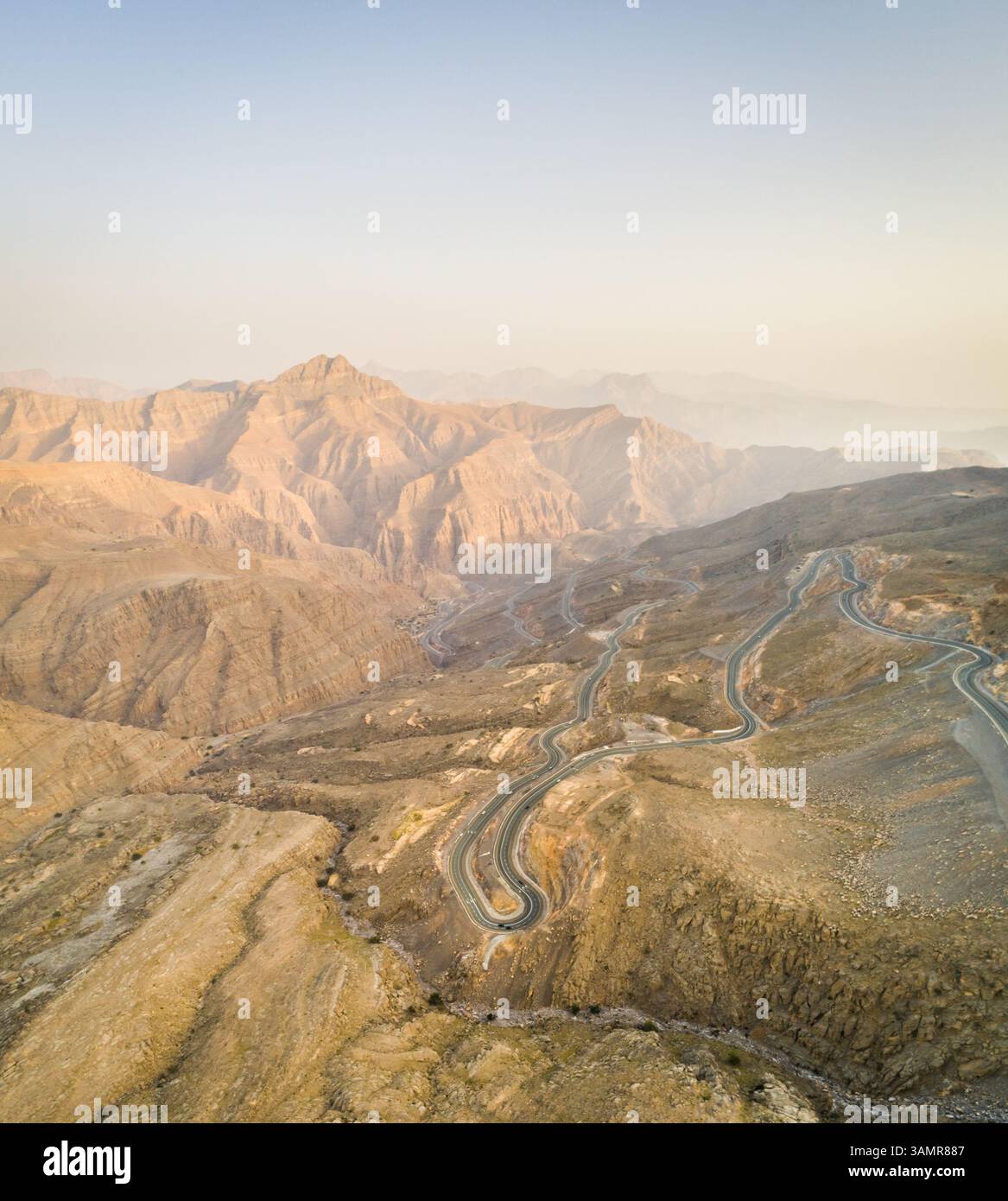 Aerial view of serpentine road in Jebel Jais rocky mountains in Ras Al ...