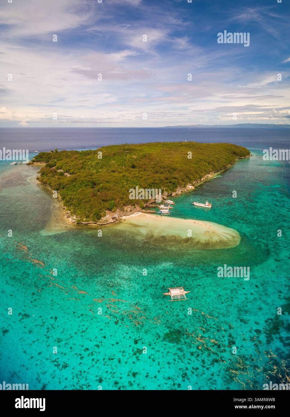 Aerial view of Sumilon Island and outrigger boats, Philippines Stock ...