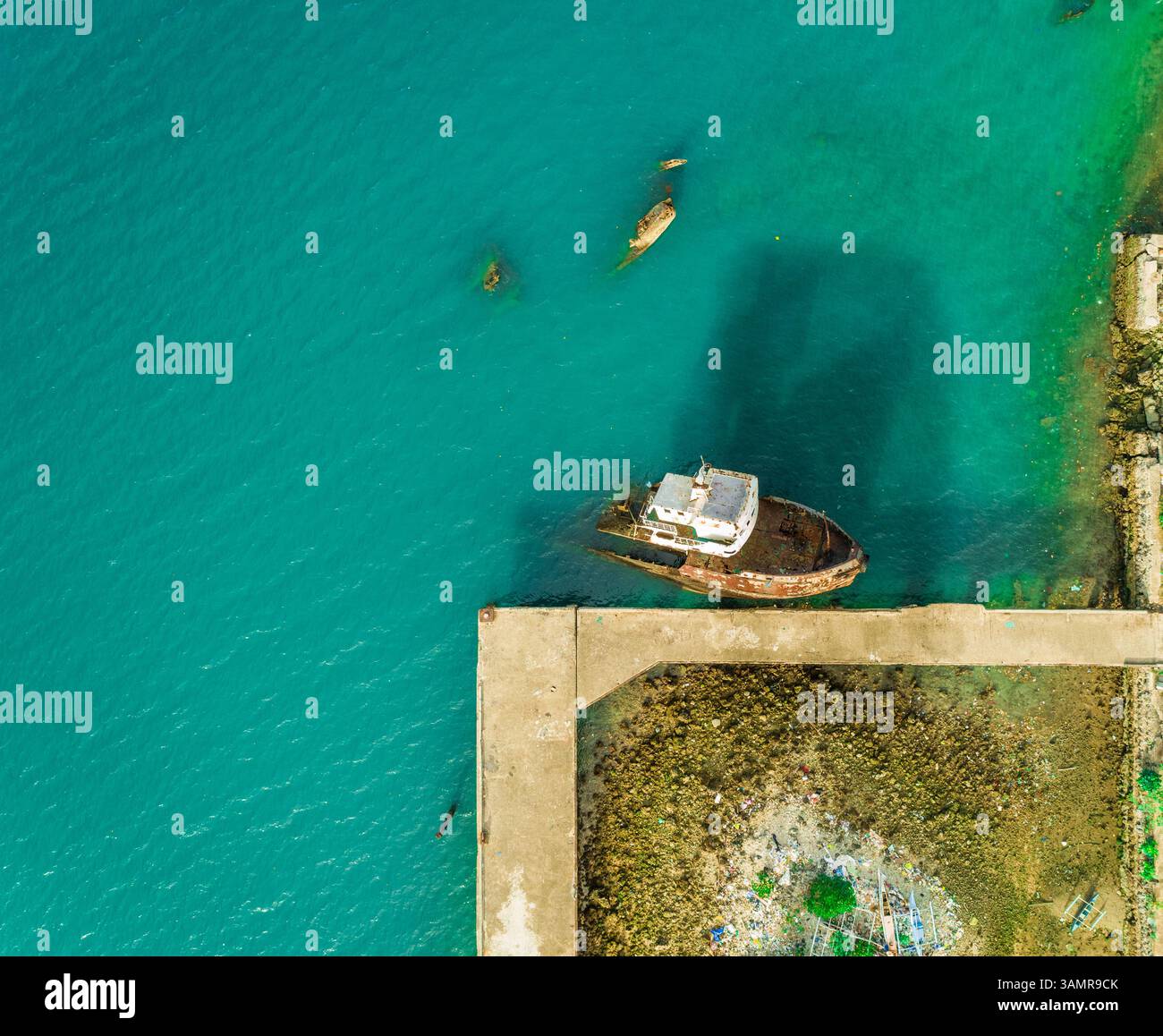 Aerial view of rusty shipwreck by Shell Island, Philippines Stock Photo ...