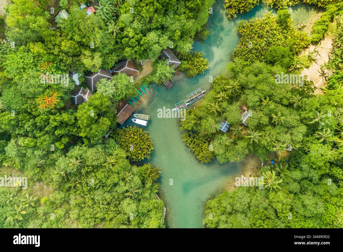 Aerial view of traditional fishing boats in Bojo River, Aloguinsan ...