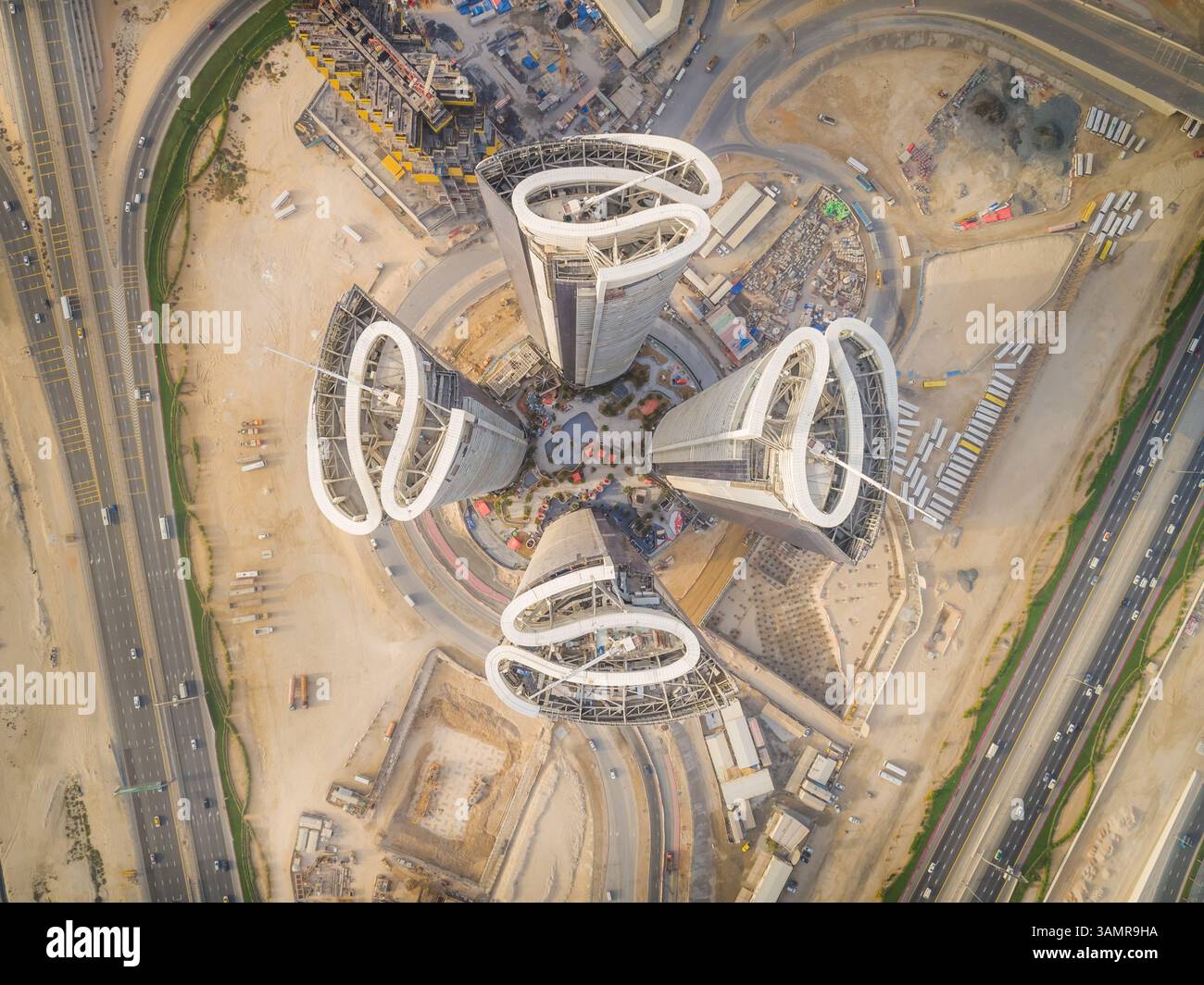 Aerial view of four wavy rooftops of skyscrapers in Dubai, UAE Stock ...