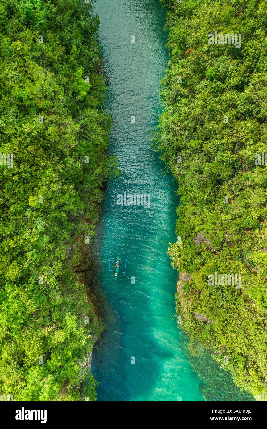 Aerial view of traditional fishing boat in Bojo River, Aloguinsan ...