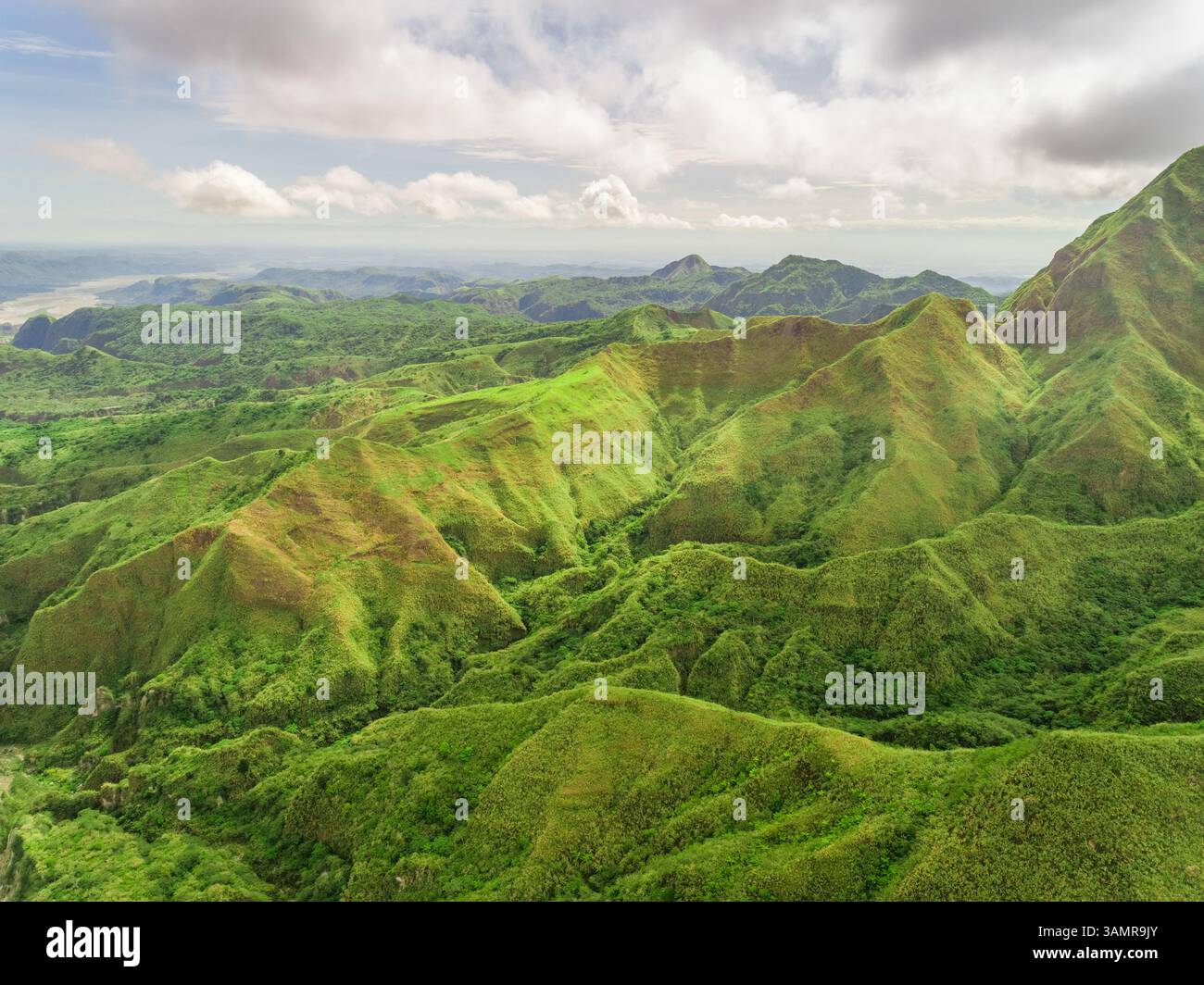 Aerial view of green hills in valley, Porac, Philippines Stock Photo ...