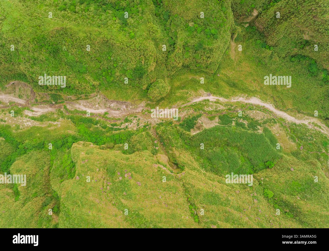 Aerial view of winding road in valley in Porac, Philippines Stock Photo ...