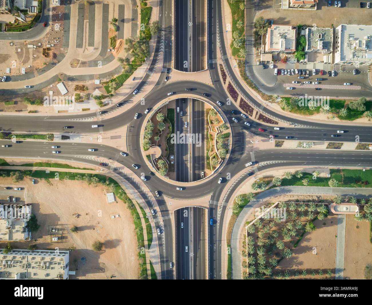 Aerial view of geometrical roundabout and roads in Al Jimi area, Abu ...