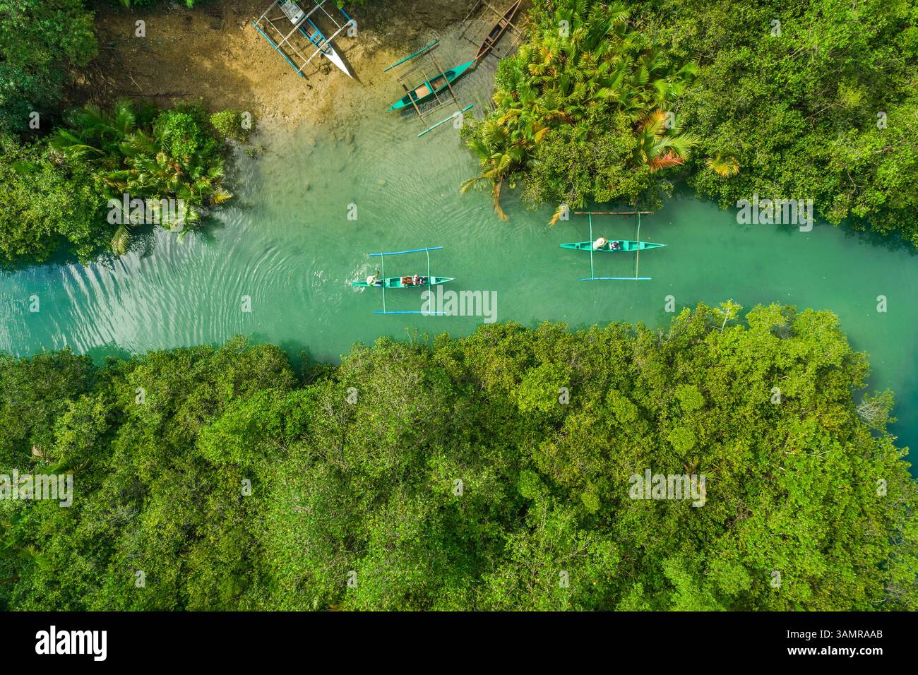 Aerial view of traditional fishing boats in Bojo River, Aloguinsan ...