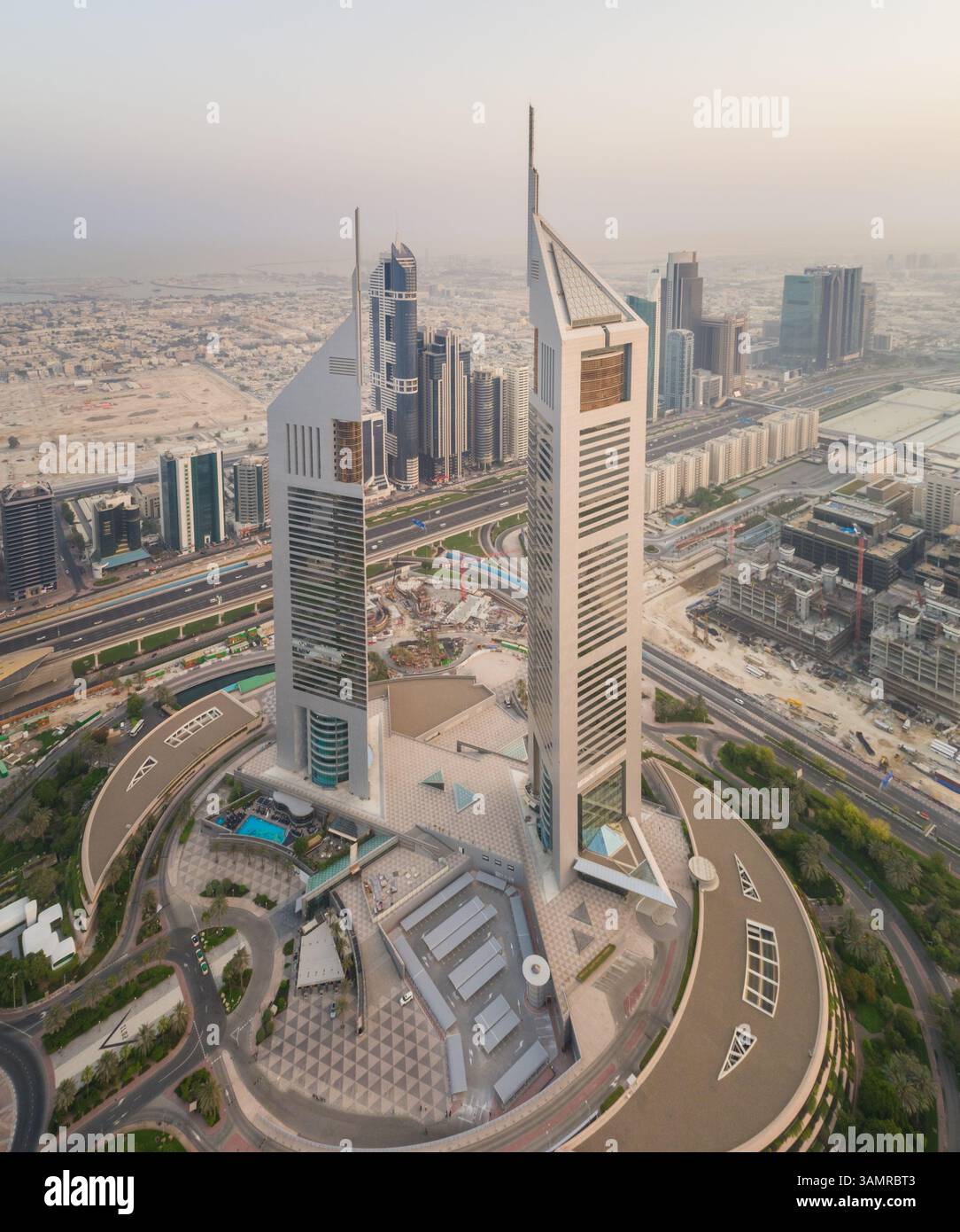 Aerial view of the Emirates Towers in misty Dubai, U.A.E Stock Photo ...