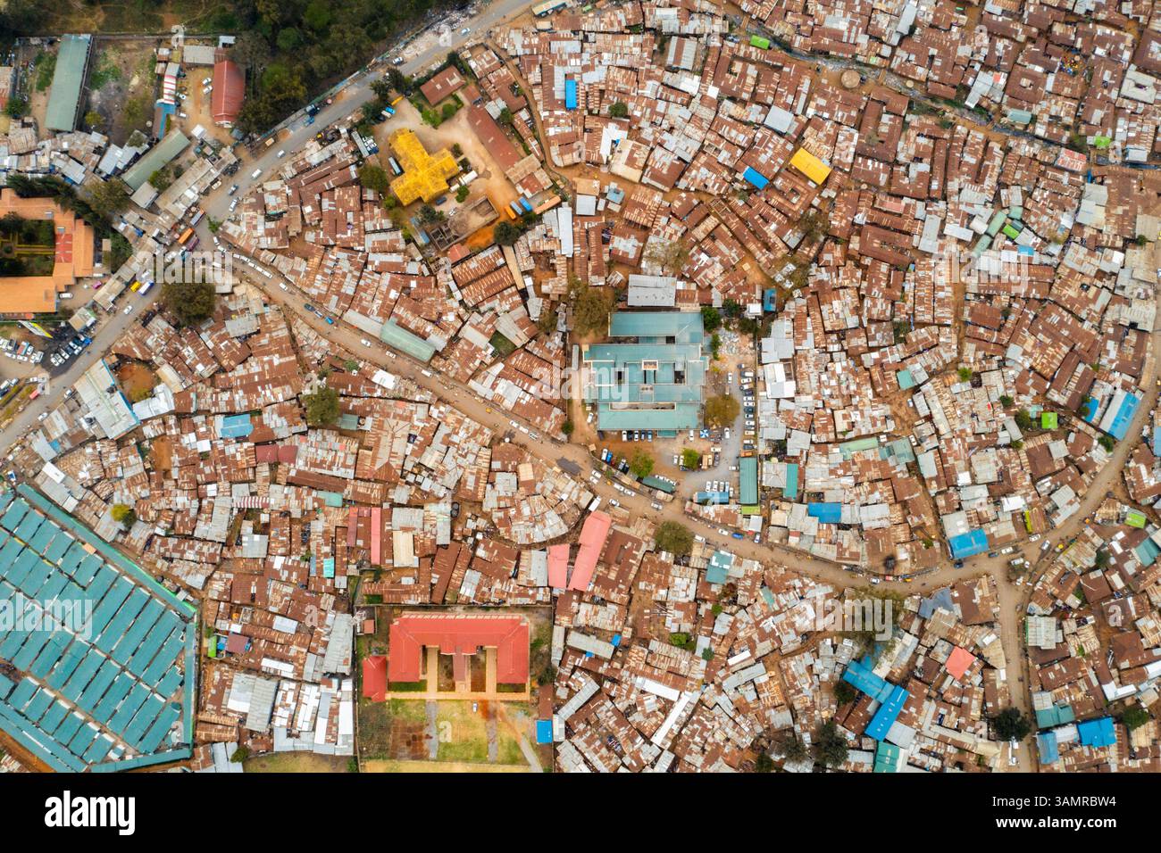 Aerial view of colorful rooftops and crowded buildings in Kibera slum ...