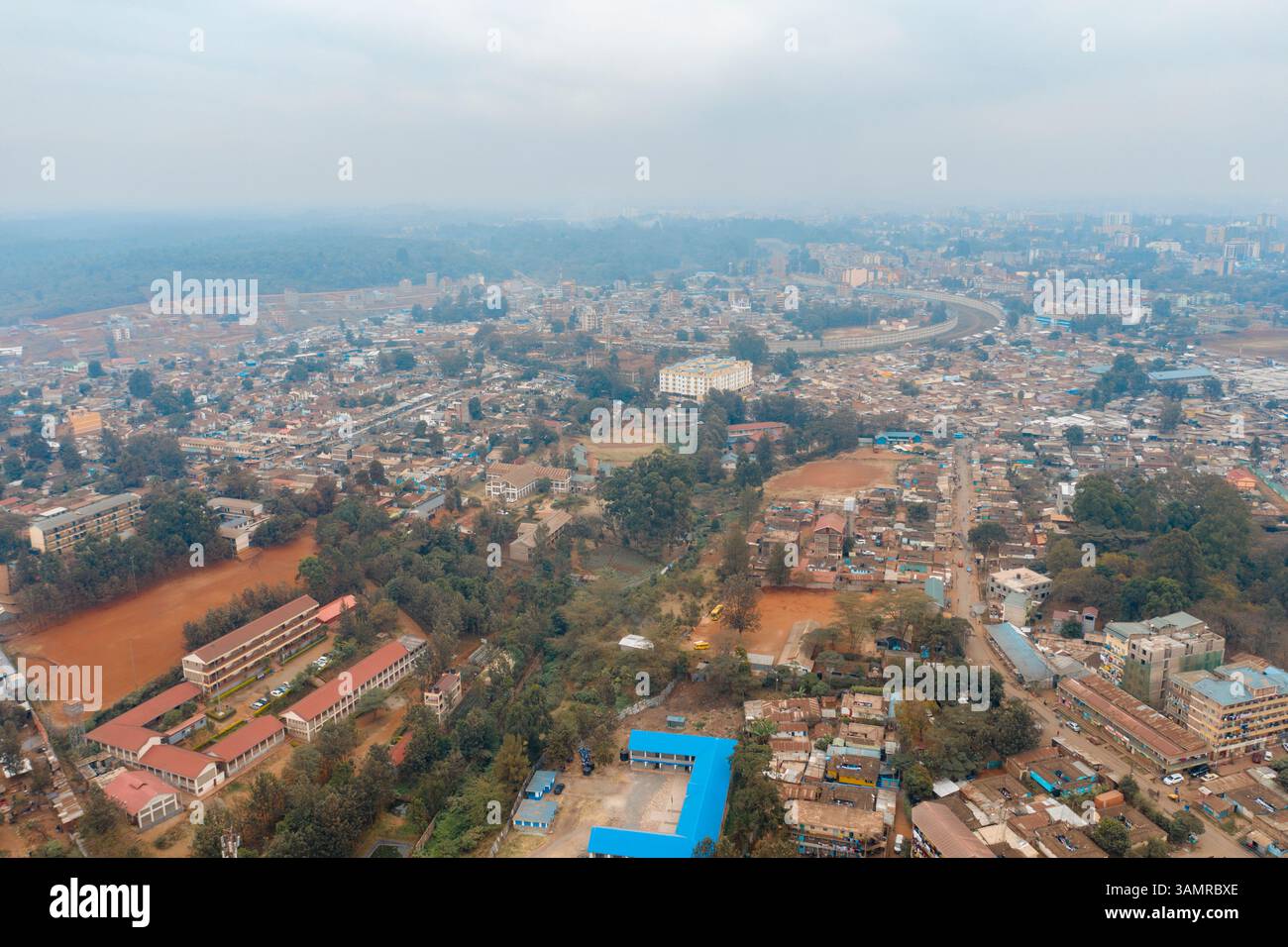 Aerial view of dense residential buildings and roads in Kibera slum ...