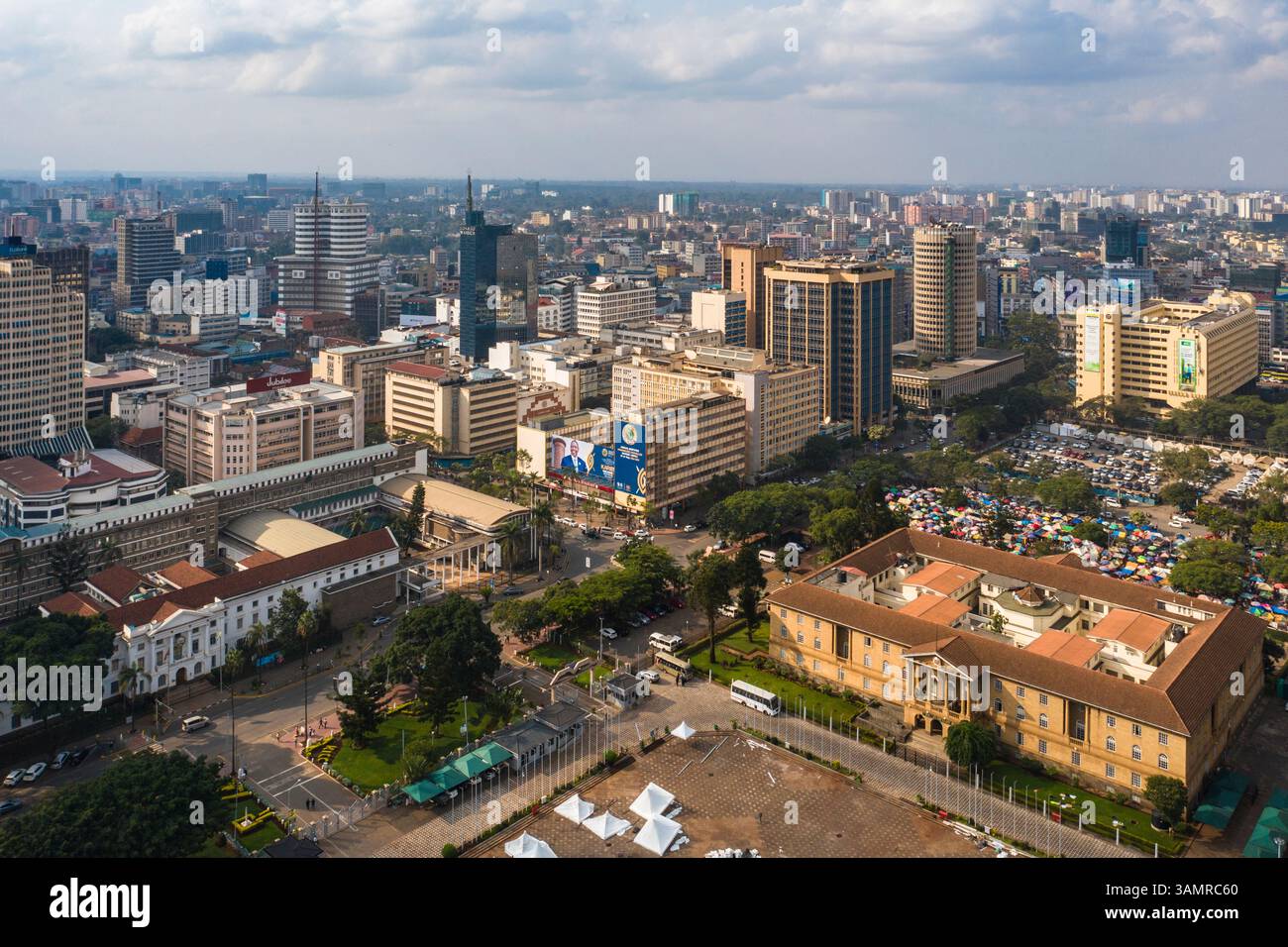 Aerial view of bustling urban skyline with modern skyscrapers and dense city life, Central ...