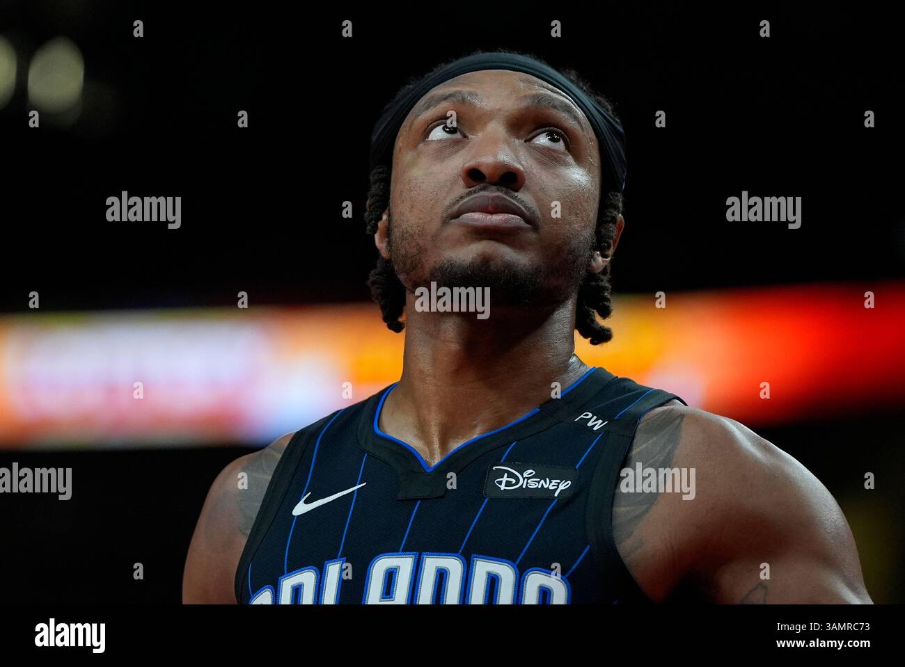 Orlando Magic center Wendell Carter Jr. (34) walks on the court during the first half of an NBA ...