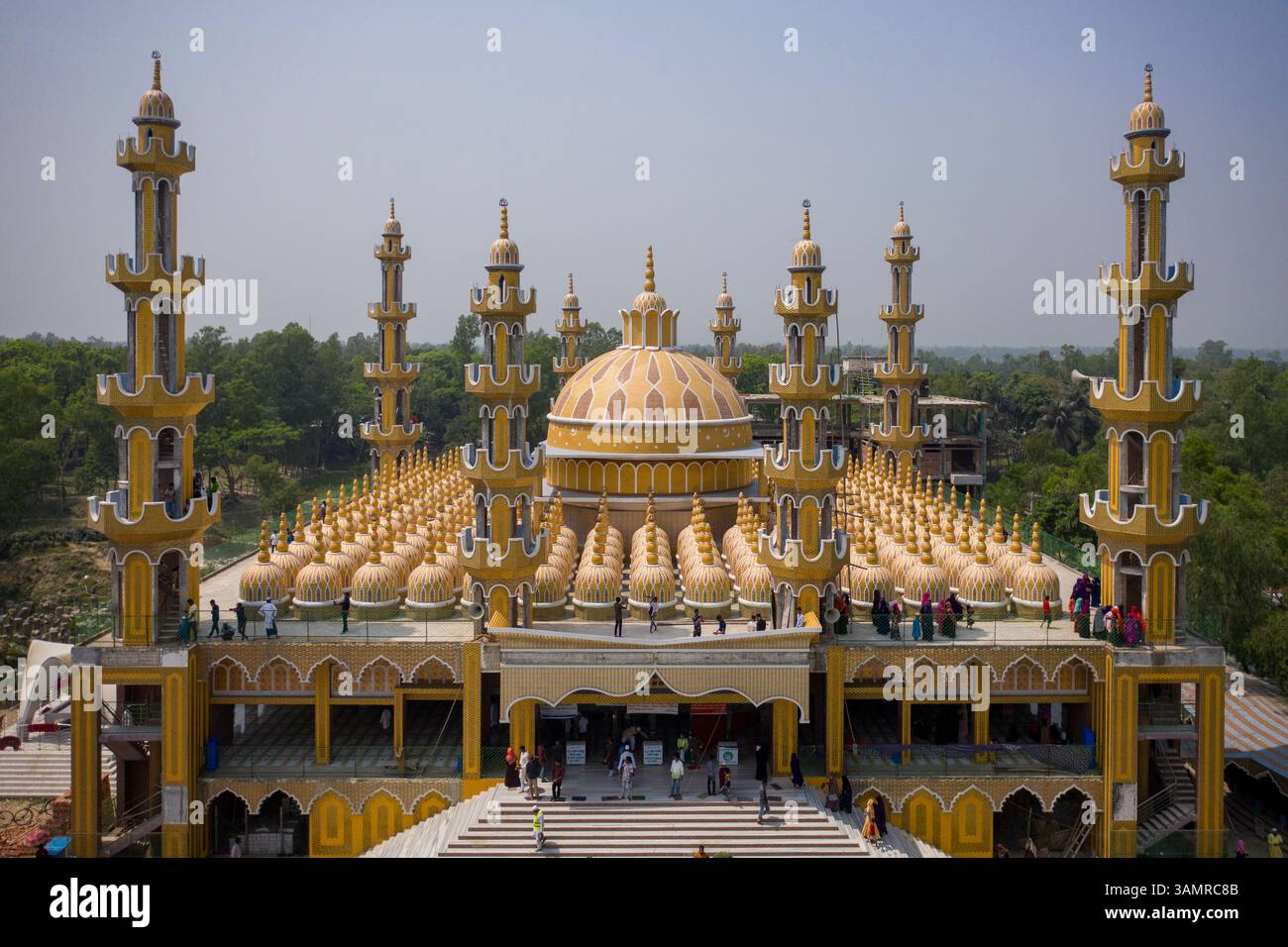 Aerial view of Gombuj Masjid islamic mosque along Jhinai river in ...