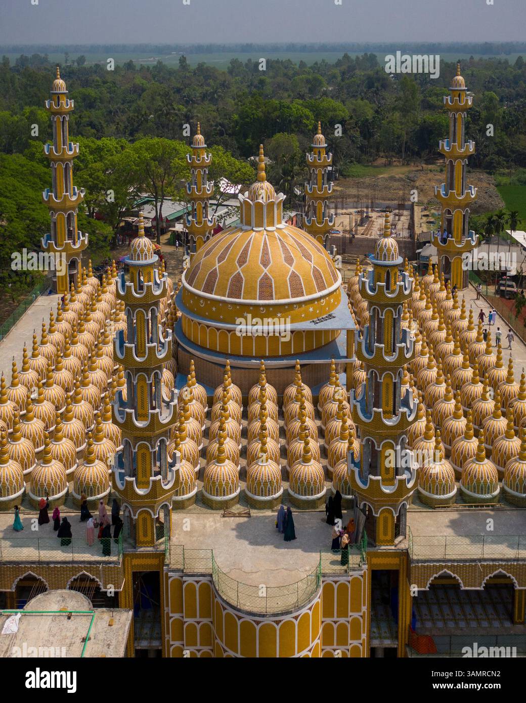 Aerial view of Gombuj Masjid islamic mosque along Jhinai river in ...
