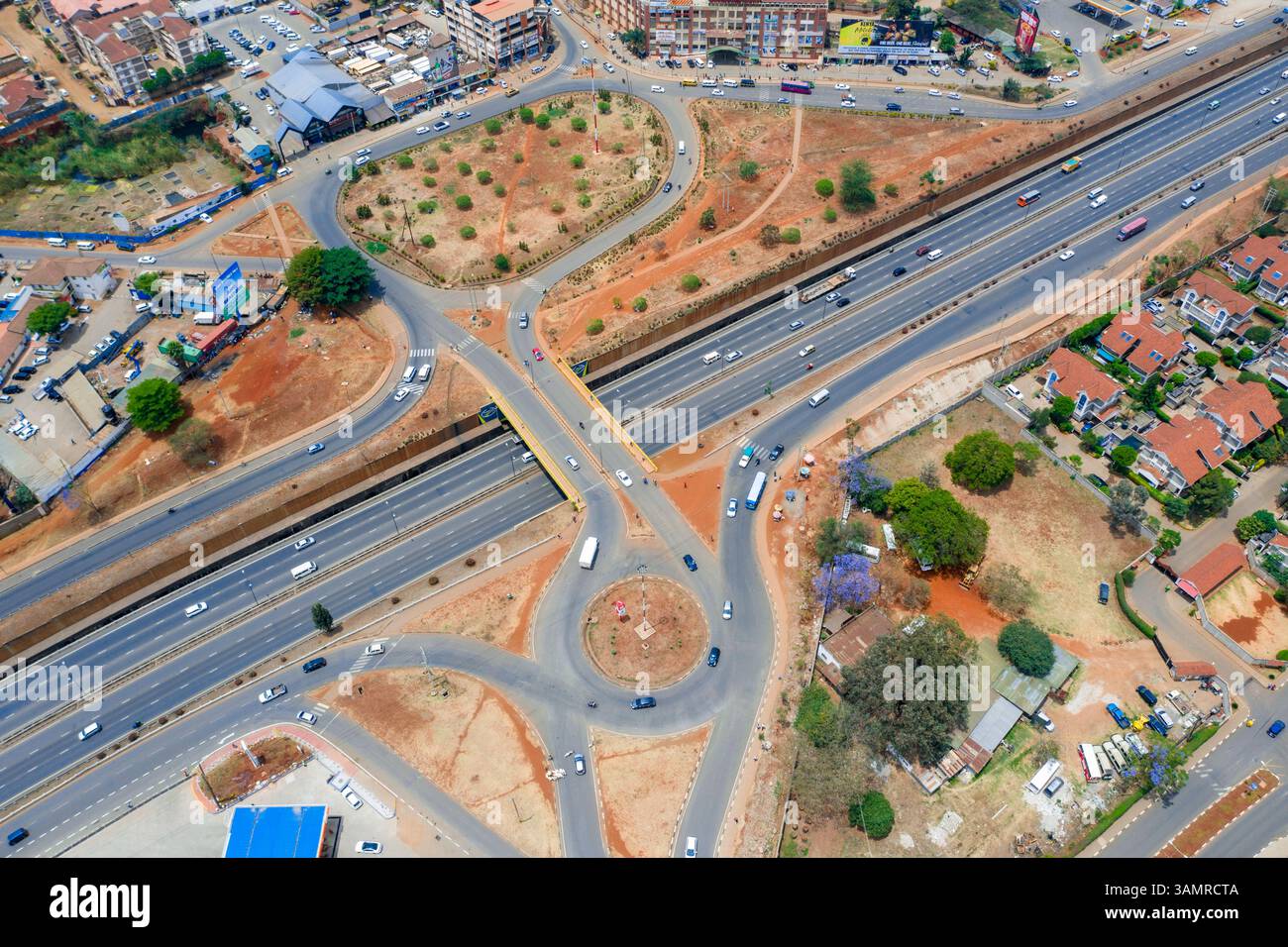 Aerial view of a busy urban intersection with vehicles on Thika Road ...