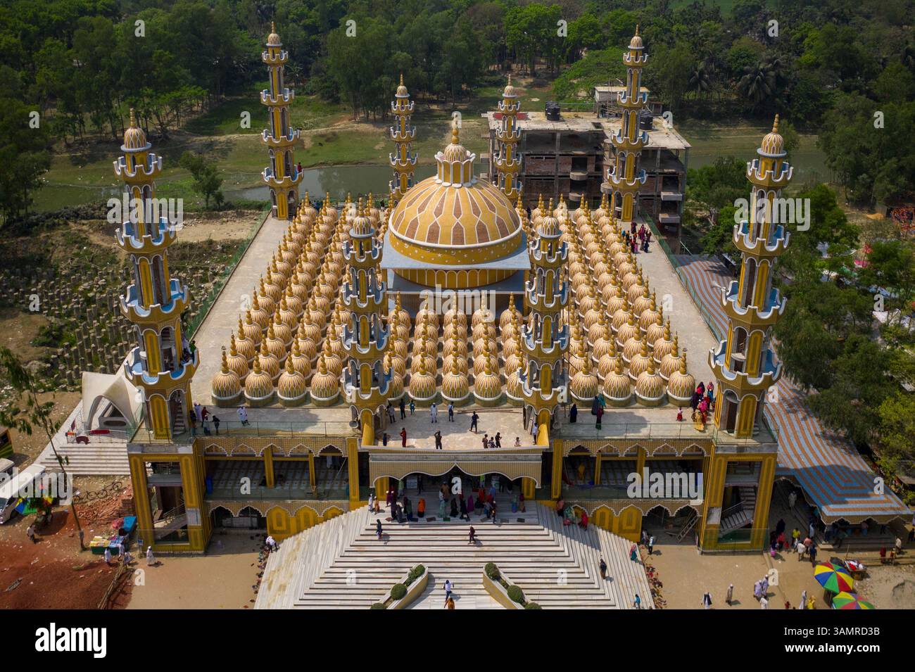 Aerial view of Gombuj Masjid islamic mosque along Jhinai river in ...
