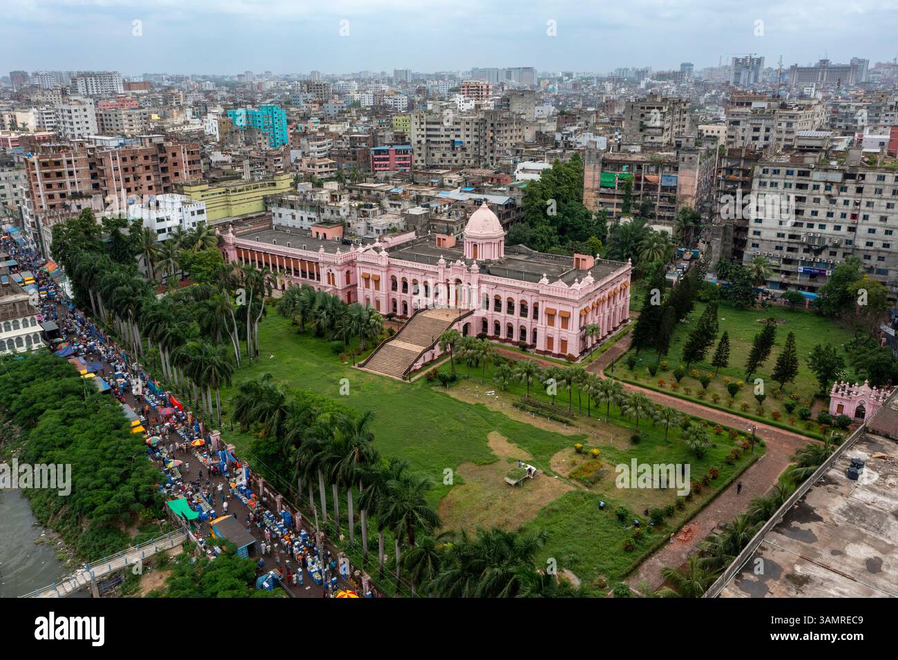 Aerial view of vibrant cityscape featuring historical palace and lush ...