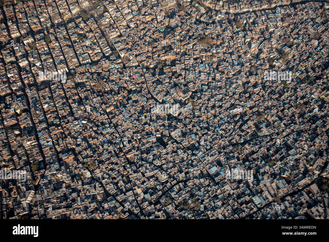 Aerial view of densely populated urban landscape with intricate ...