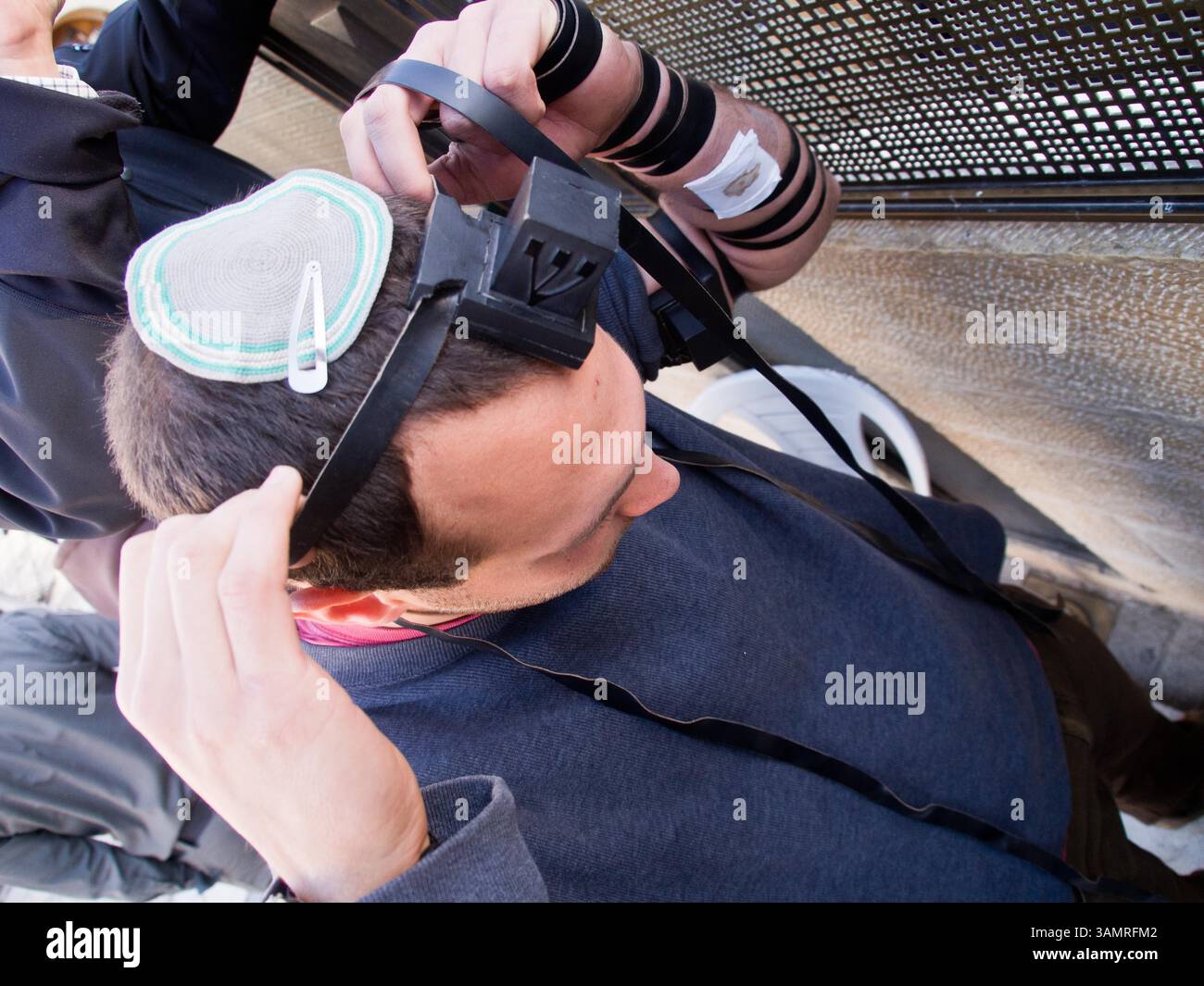 Jan. 31, 2014 - Jerusalem, Israel - A man lays Phylacteries on his ...