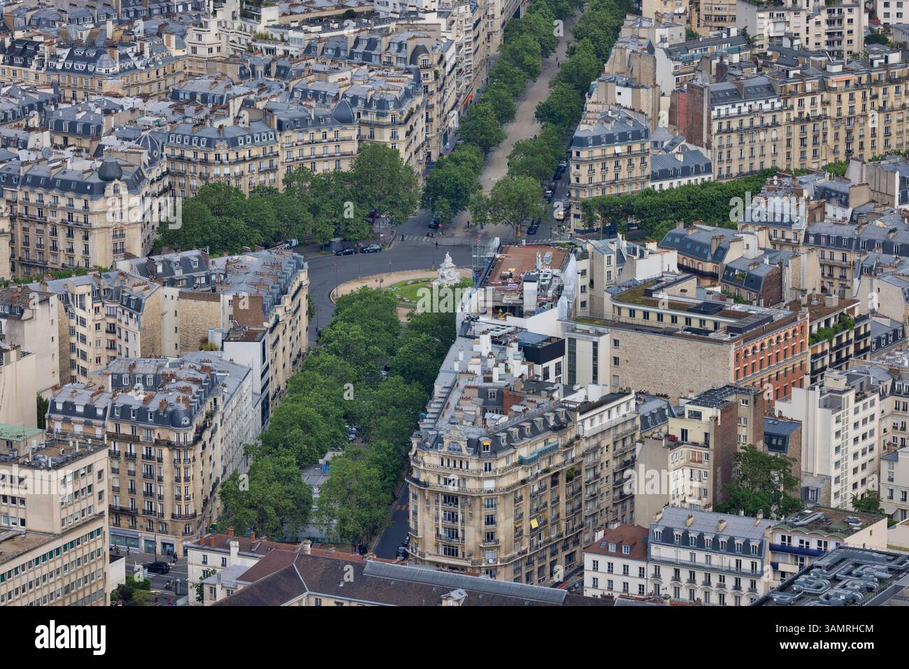 Aerial view of urban landscape with buildings, streets, and rooftops in ...