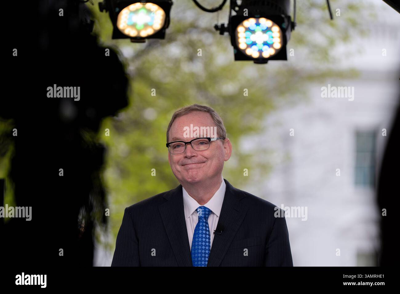 White House economic adviser Kevin Hassett does a television interview ...