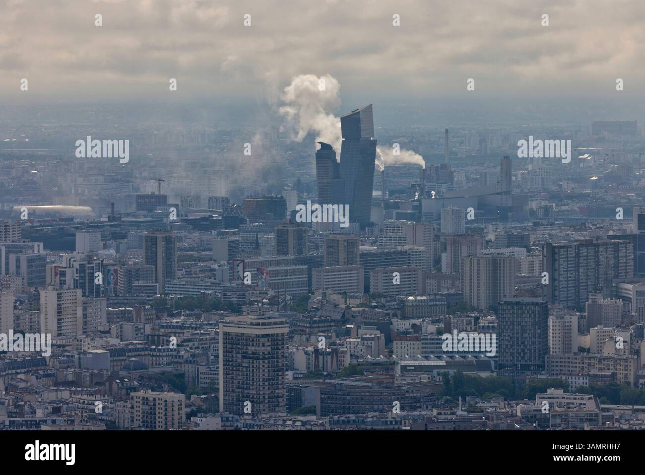 Aerial view of hazy Paris city center with high rise buildings and ...