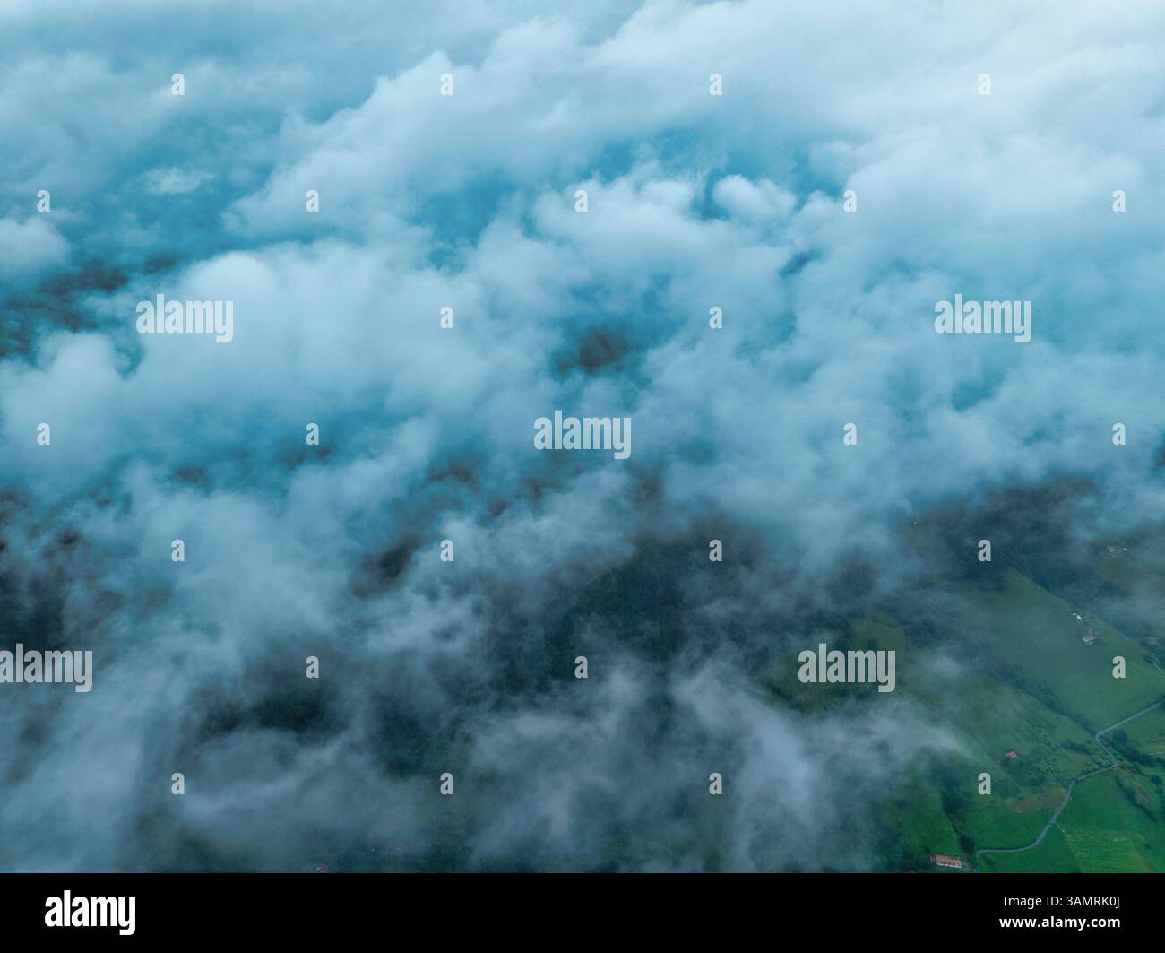 Aerial view of serene countryside with expansive green fields and ...