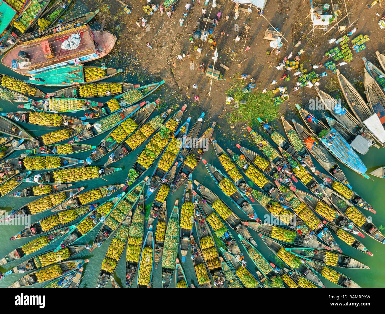 Aerial view of floating market of seasonal fruits on the boats in ...