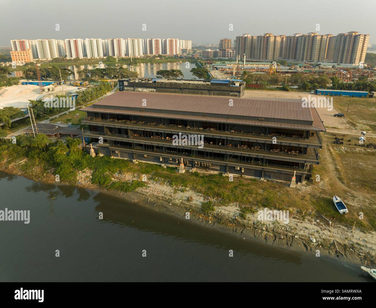Aerial view of Dhaka Boat Club Limited along Turag river in Dhaka city ...