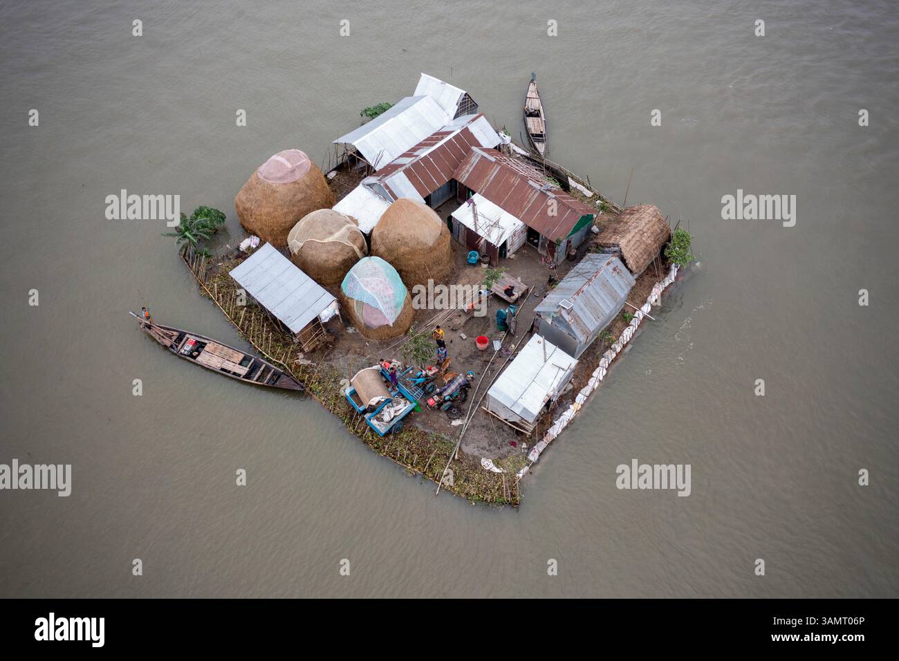 Aerial view of people working on a floating platform for fishing in ...