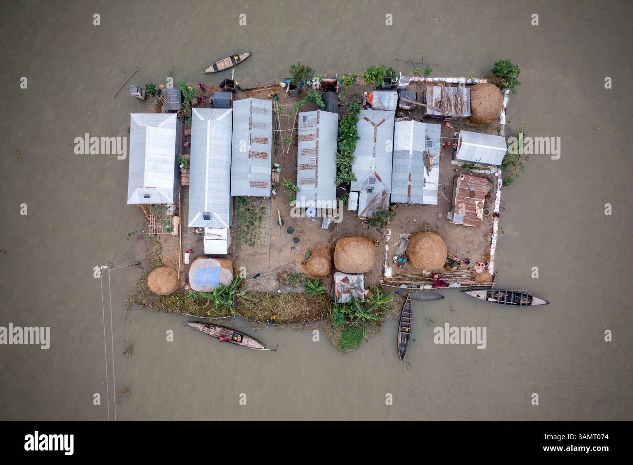 Aerial view of people working on a floating platform for fishing in ...