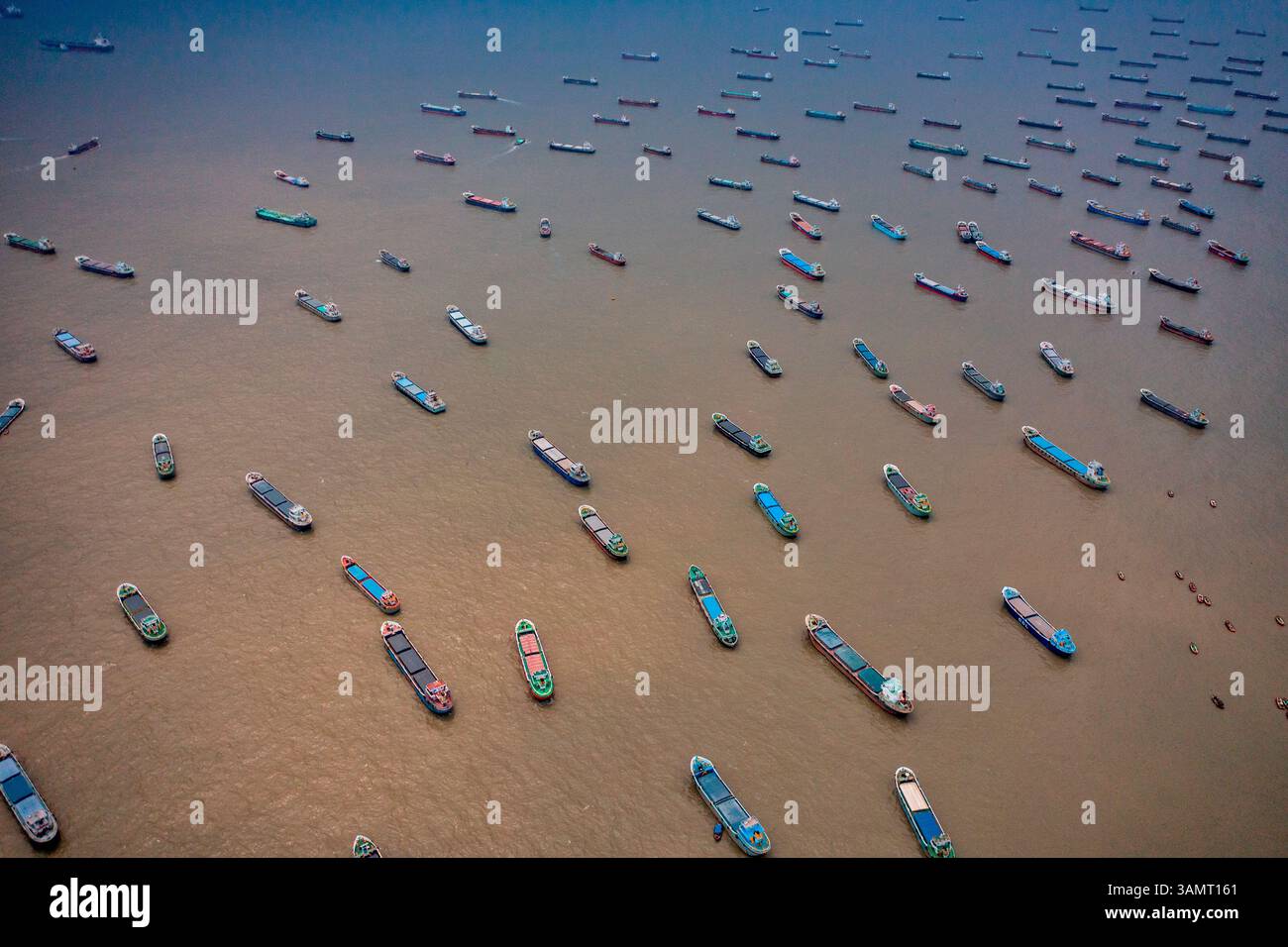 Aerial view of Cargo ships sailing the Karnaphuli river, Chittagong ...