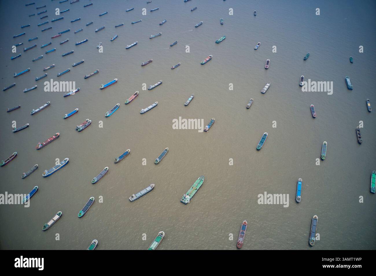 Aerial view of Cargo ships sailing the Karnaphuli river, Chittagong ...