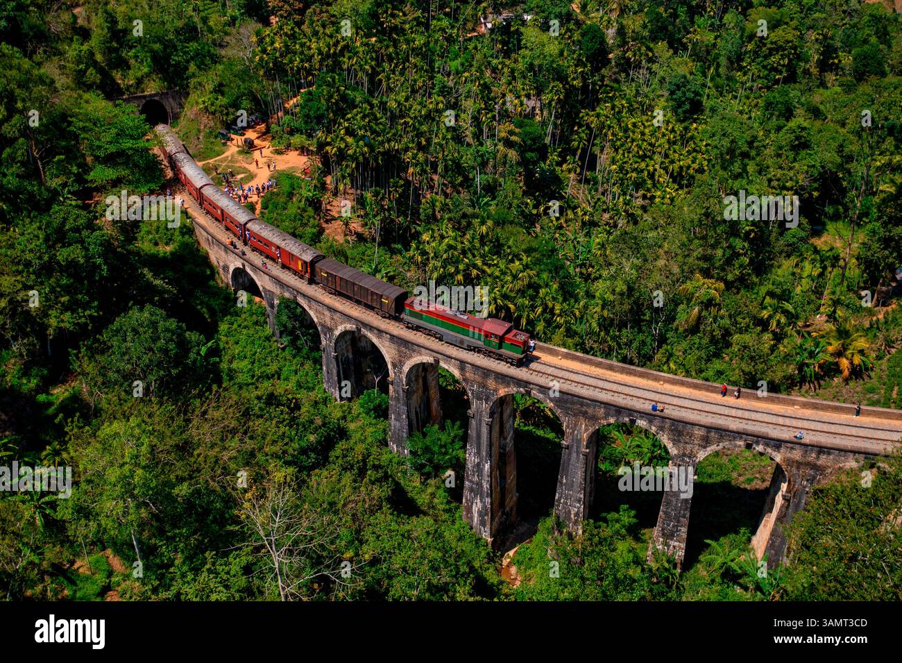 Aerial view of a train crossing the Nine Arch Bridge in Badulla, Sri ...