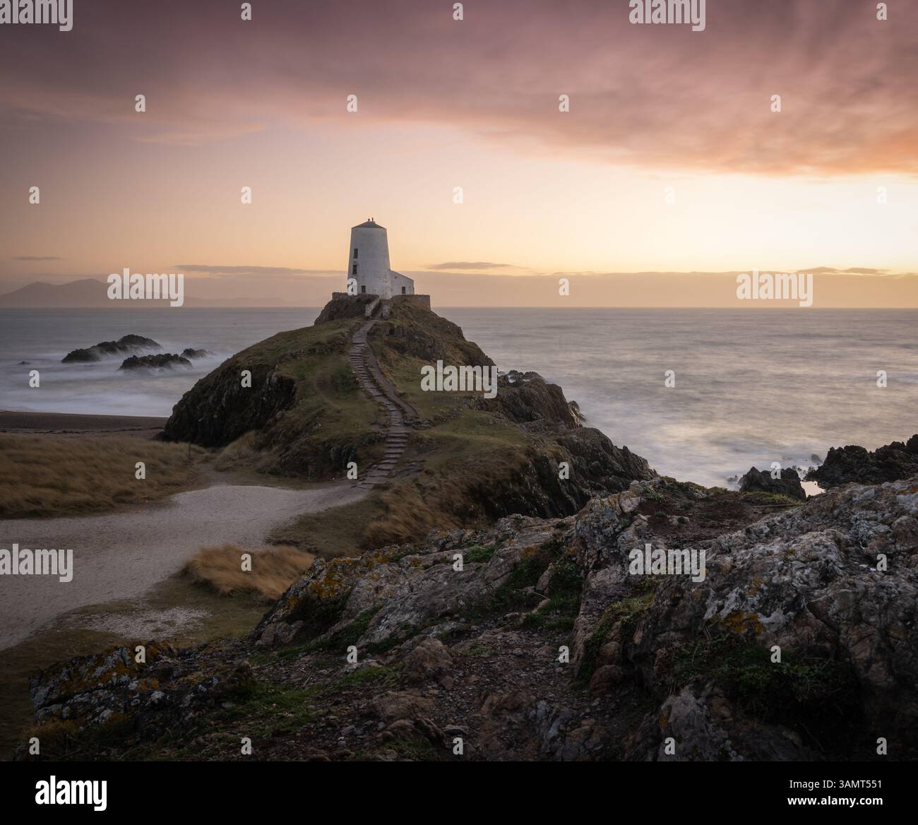 The Traeth Llanddwyn lighthouse Stock Photo - Alamy