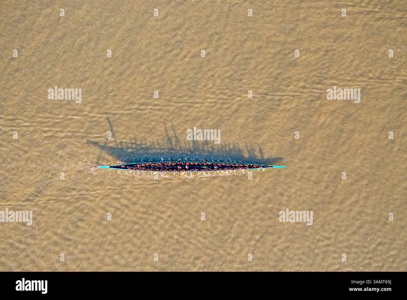 Chittagong, Bangladesh - 19 September 2021: Aerial view of a long canoe ...
