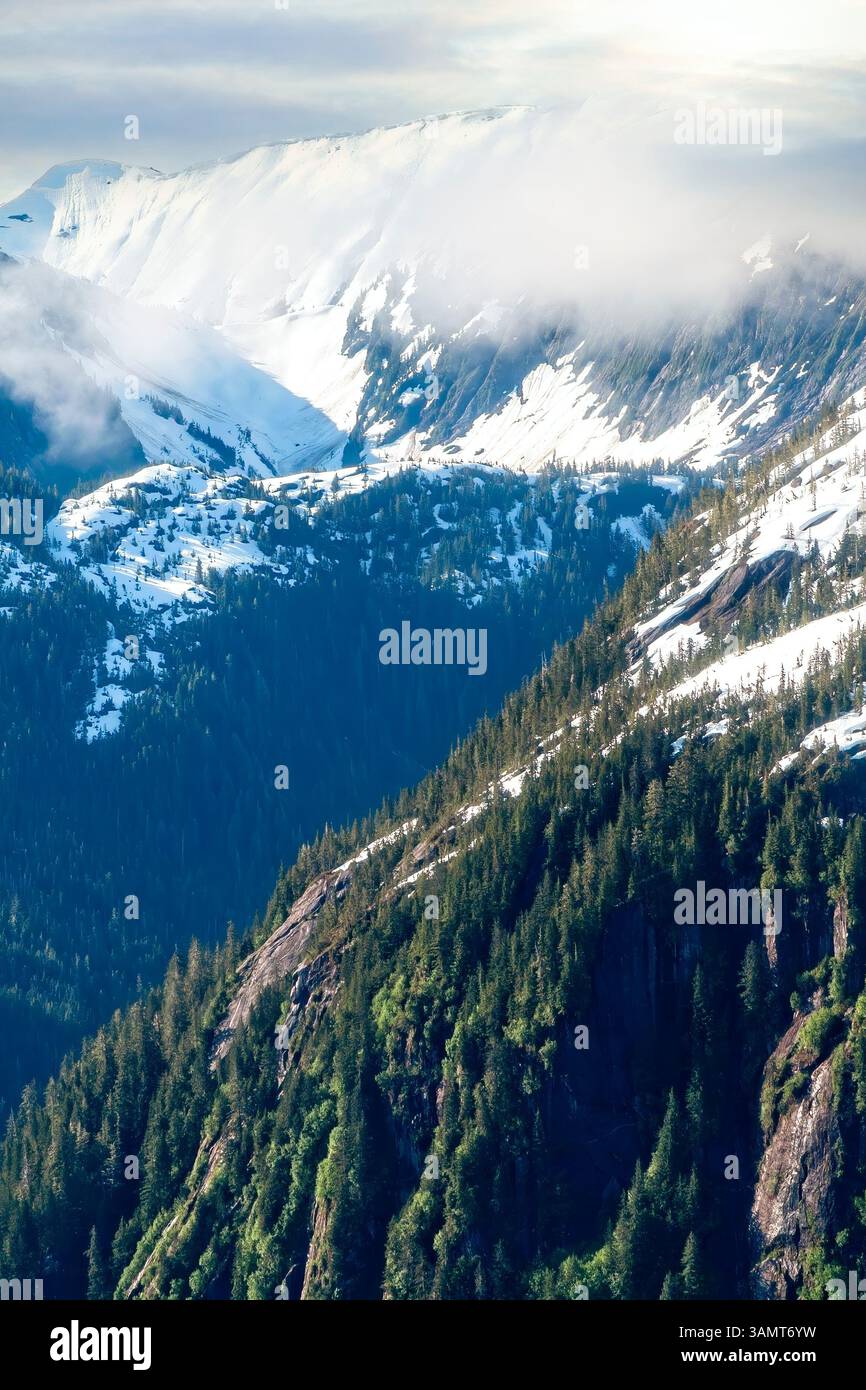 Aerial view of the majestic Alaskan Mountain Range, snow capped and rugged cliffs Stock Photo ...